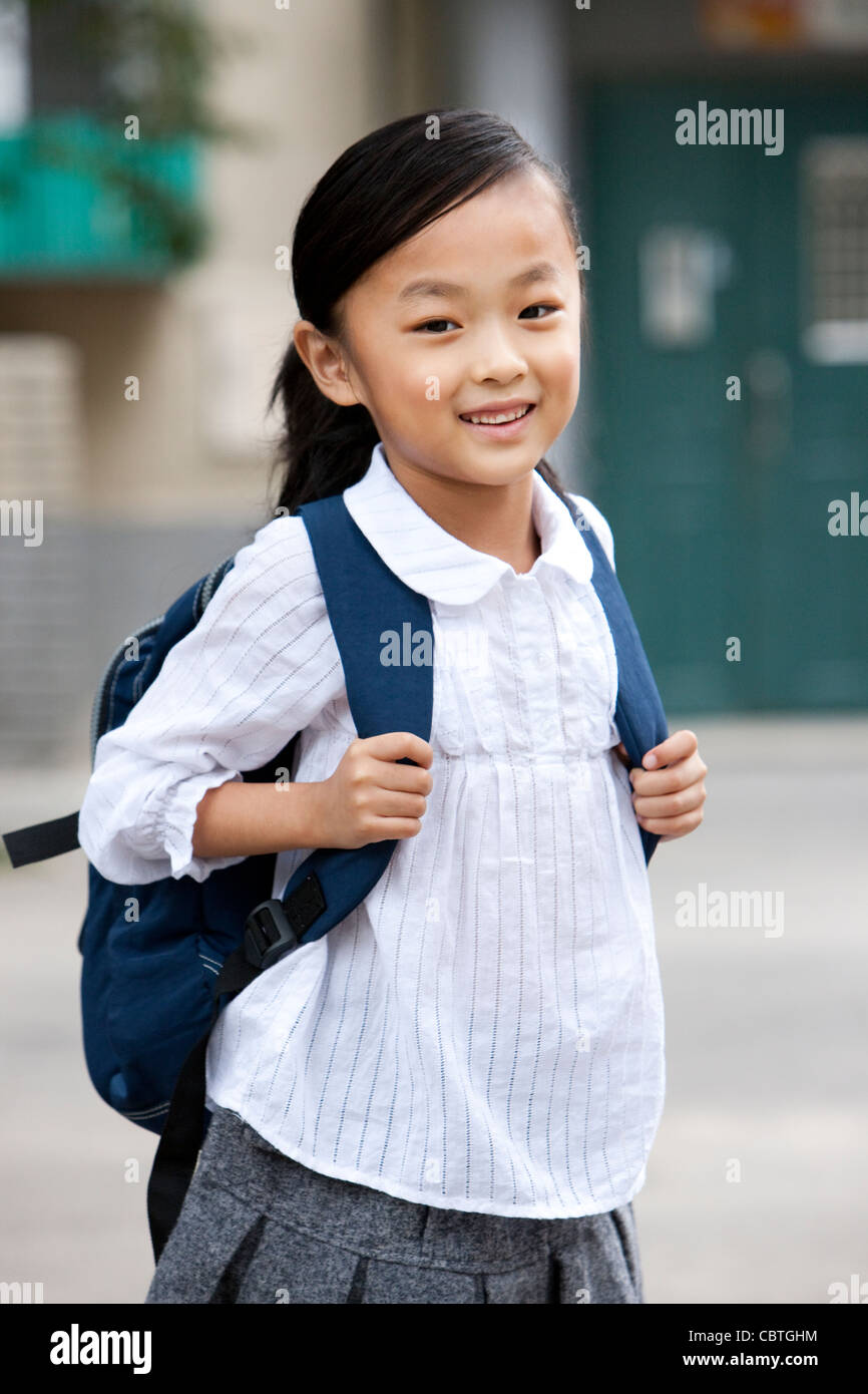 Little girl going to school Stock Photo - Alamy