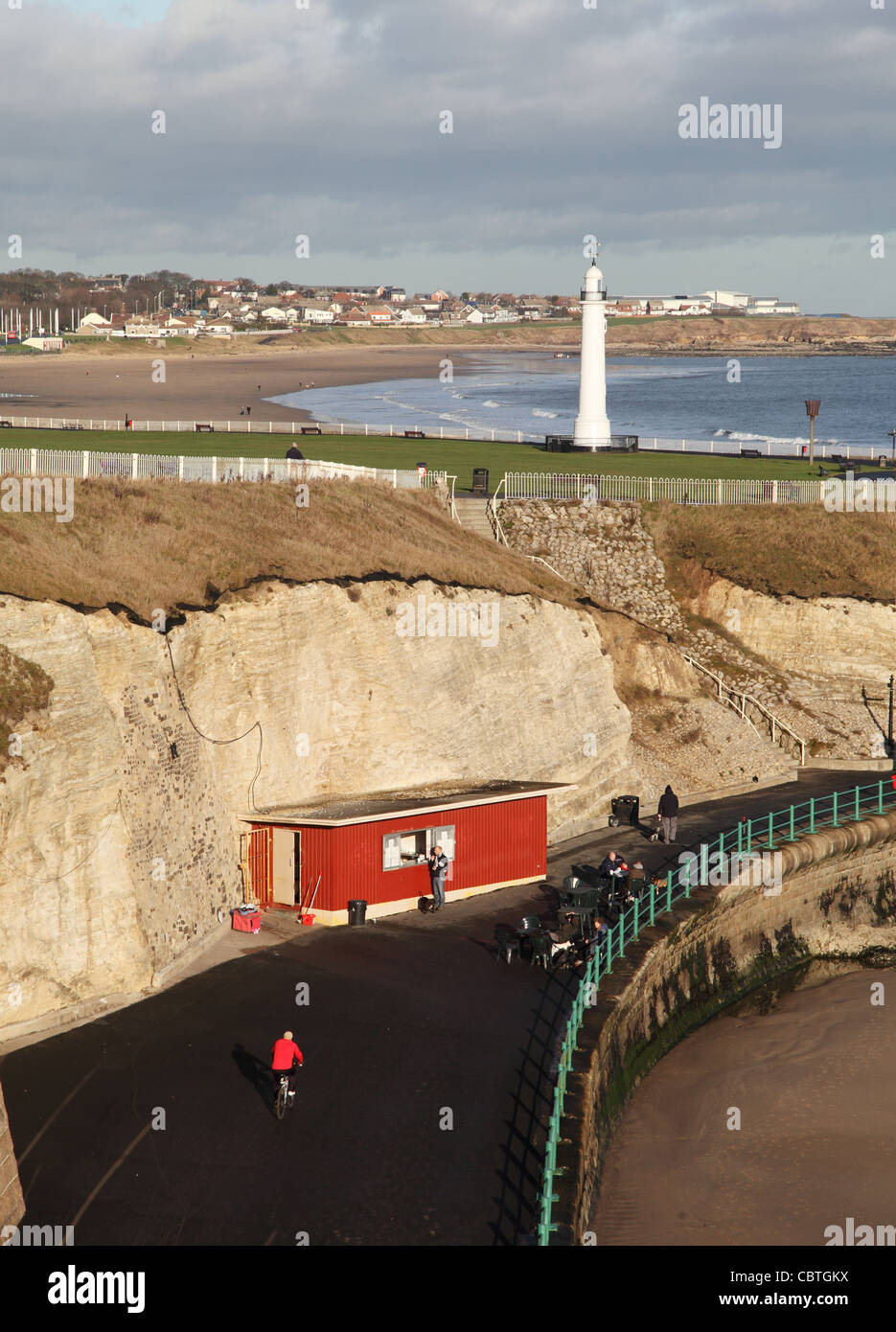 Roker seafront cafe with cyclist in foreground and old cast iron ...