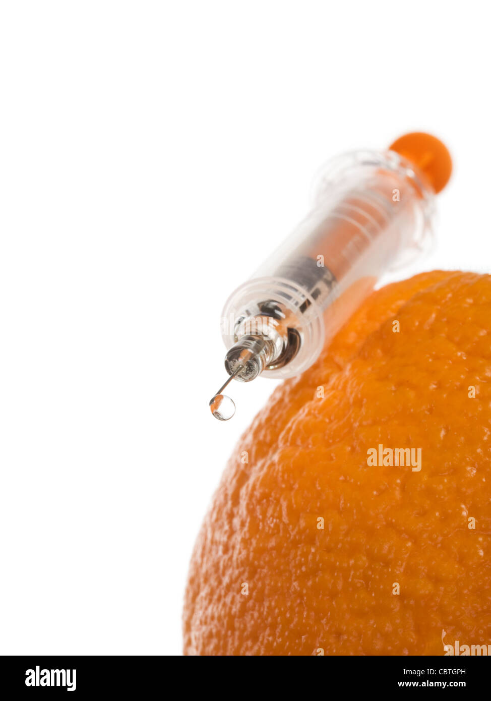 Syringe injecting orange fruit hi-res stock photography and images - Alamy