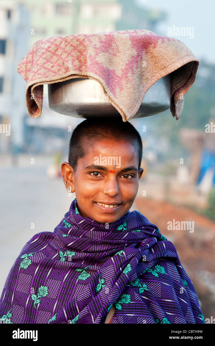 Balancing pot on head hi-res stock photography and images - Alamy