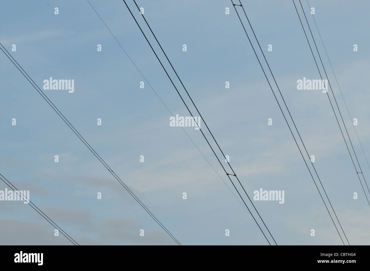 High tension - voltage power cables - over head power lines Stock Photo ...