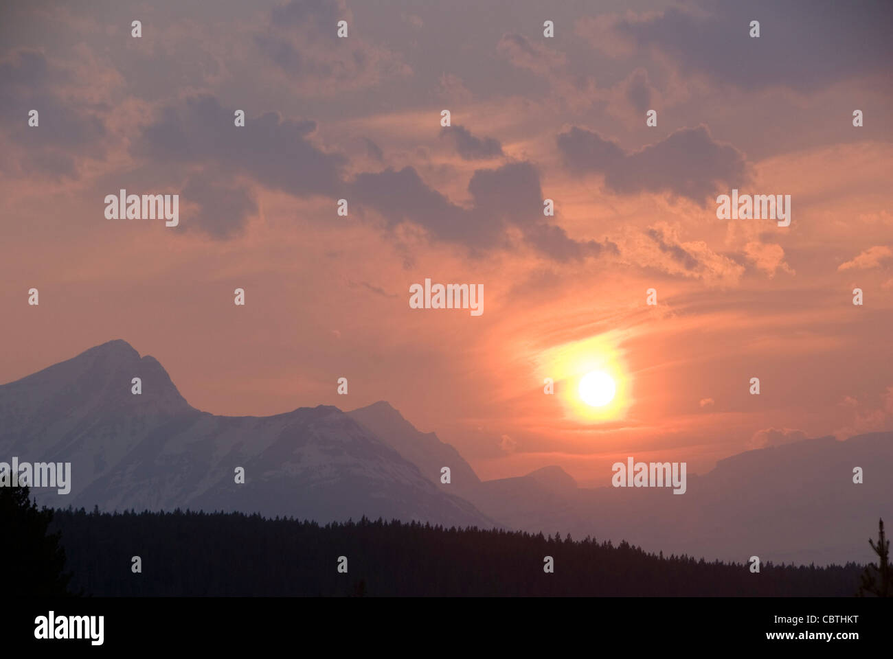 Sunset over rocky mountains, Lake Louise, Banff National Park, Alberta ...