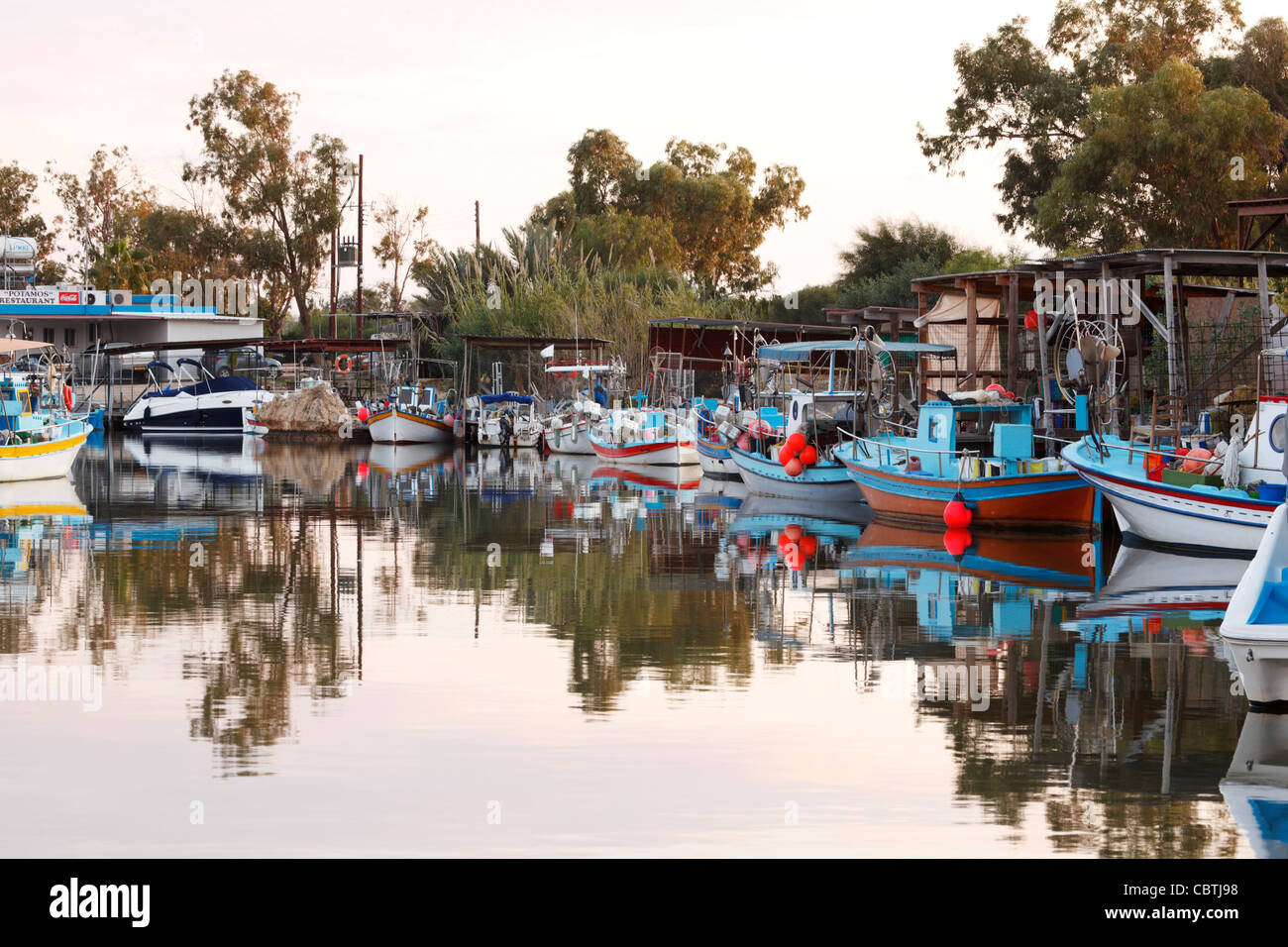 Fishing boats at dusk, Potamos Creek, Ayia Napa, Cyprus Stock Photo - Alamy