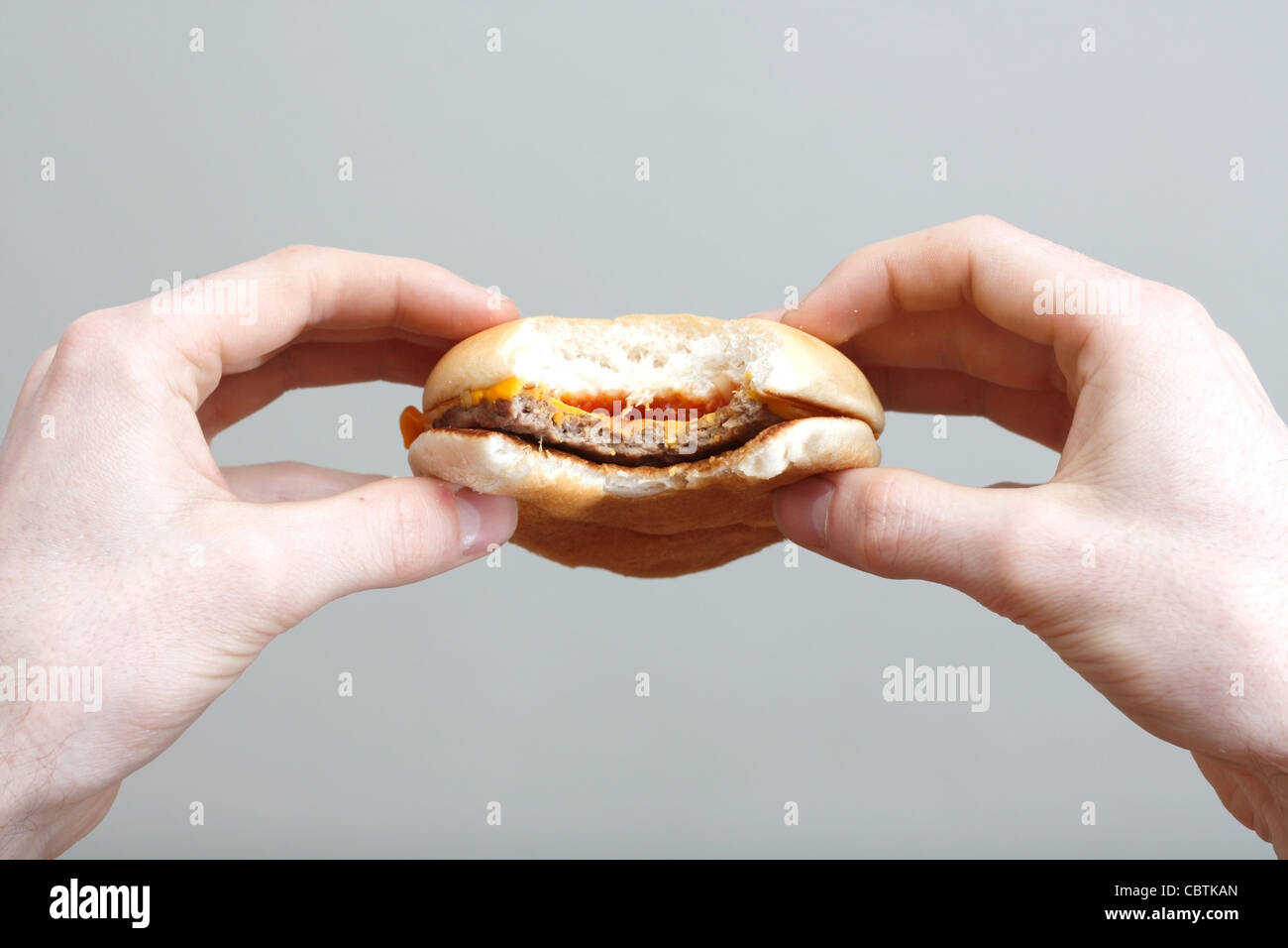 Burger in hand hi-res stock photography and images - Alamy