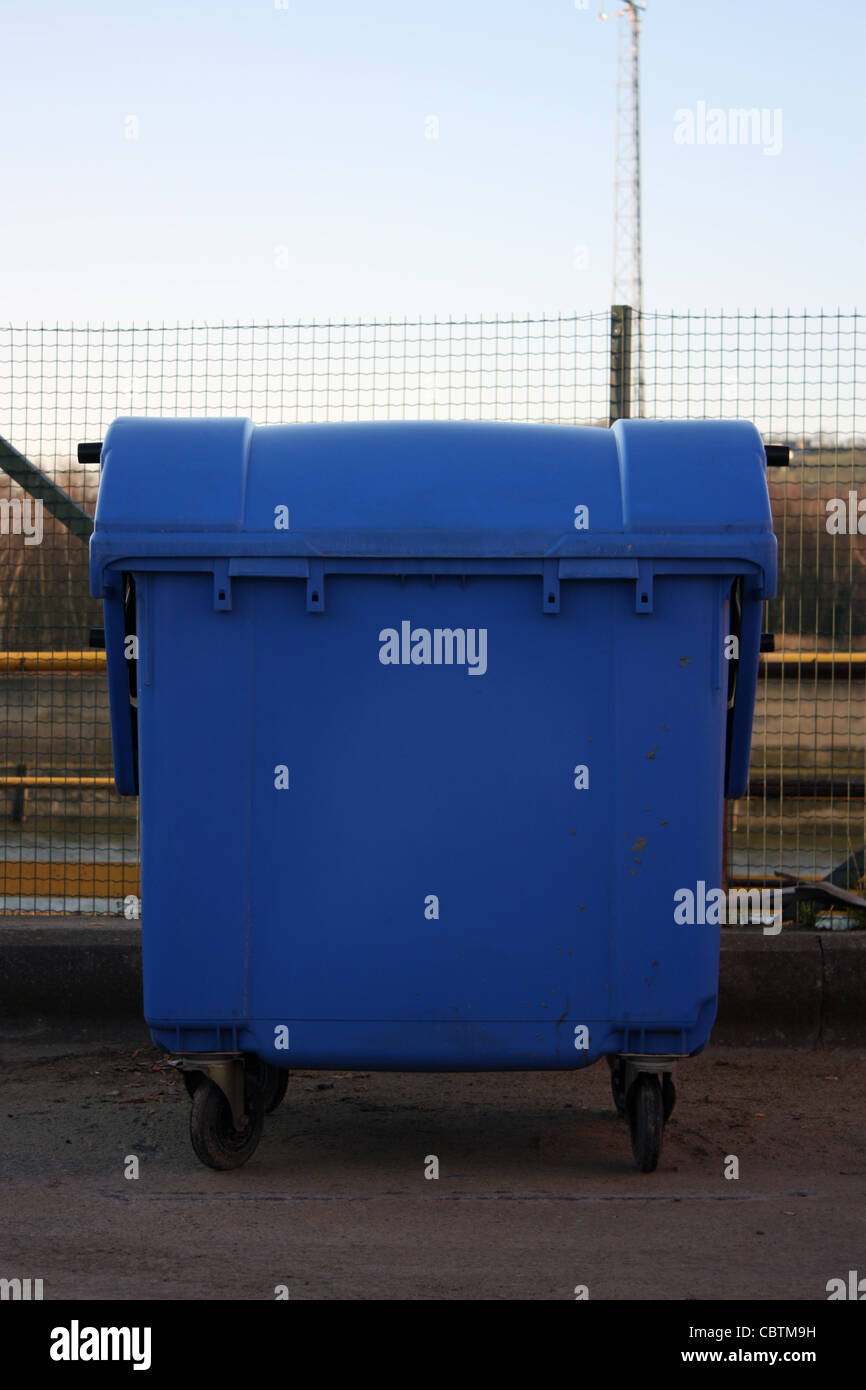 blue rolling waste container Stock Photo - Alamy
