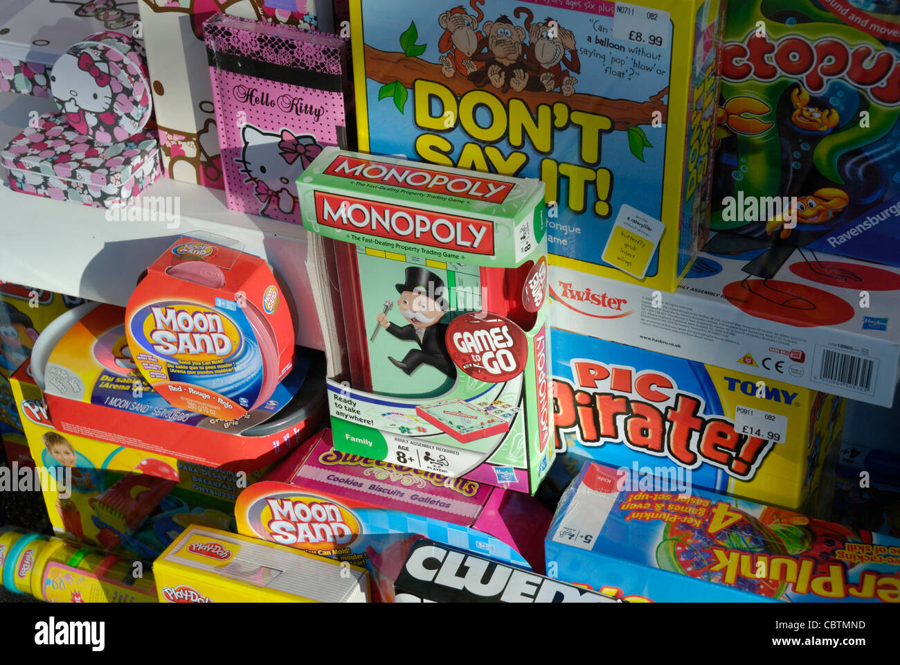 Toys and games in a shop window Stock Photo - Alamy