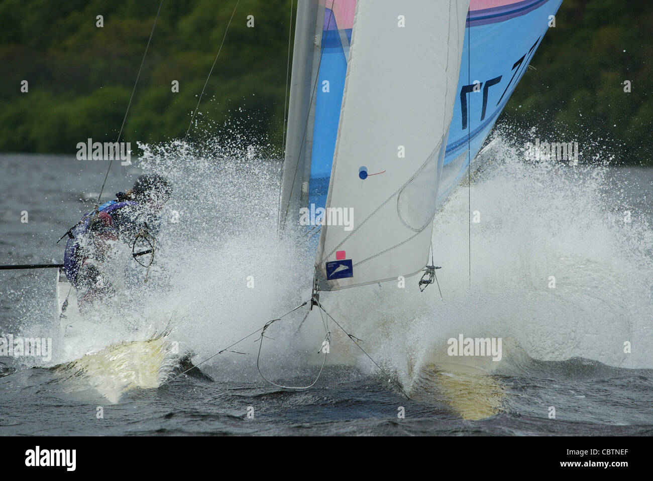 A catamaran starts to pitch pole in heavy winds Stock Photo - Alamy