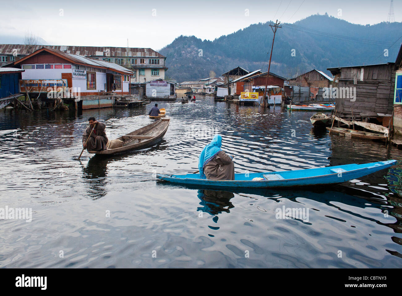 Local people commute in the Nagin lake of Srinagar. Kashmir Stock Photo ...