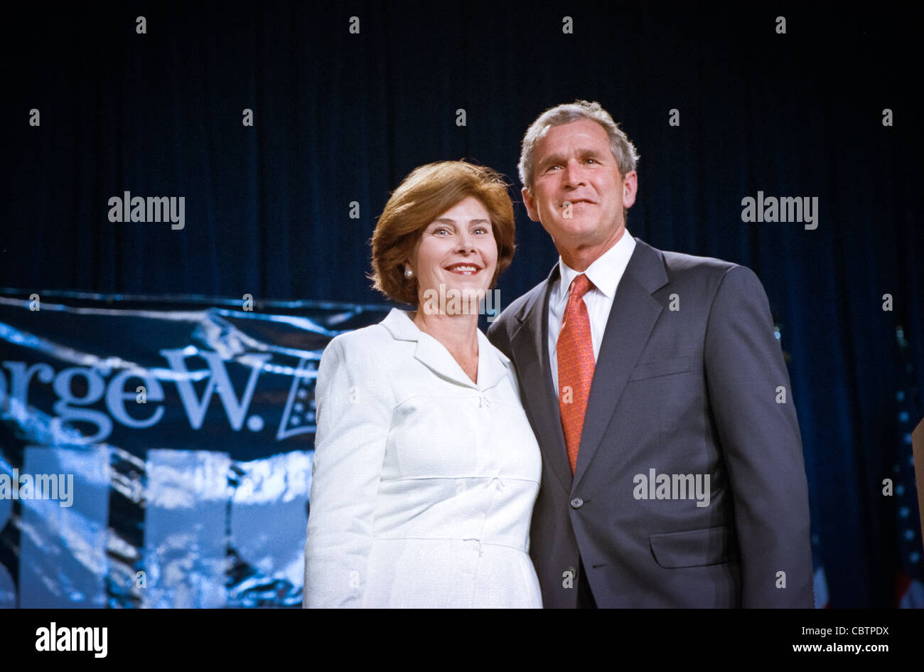 Texas Gov. George W. Bush and his wife Laura during a campaign ...