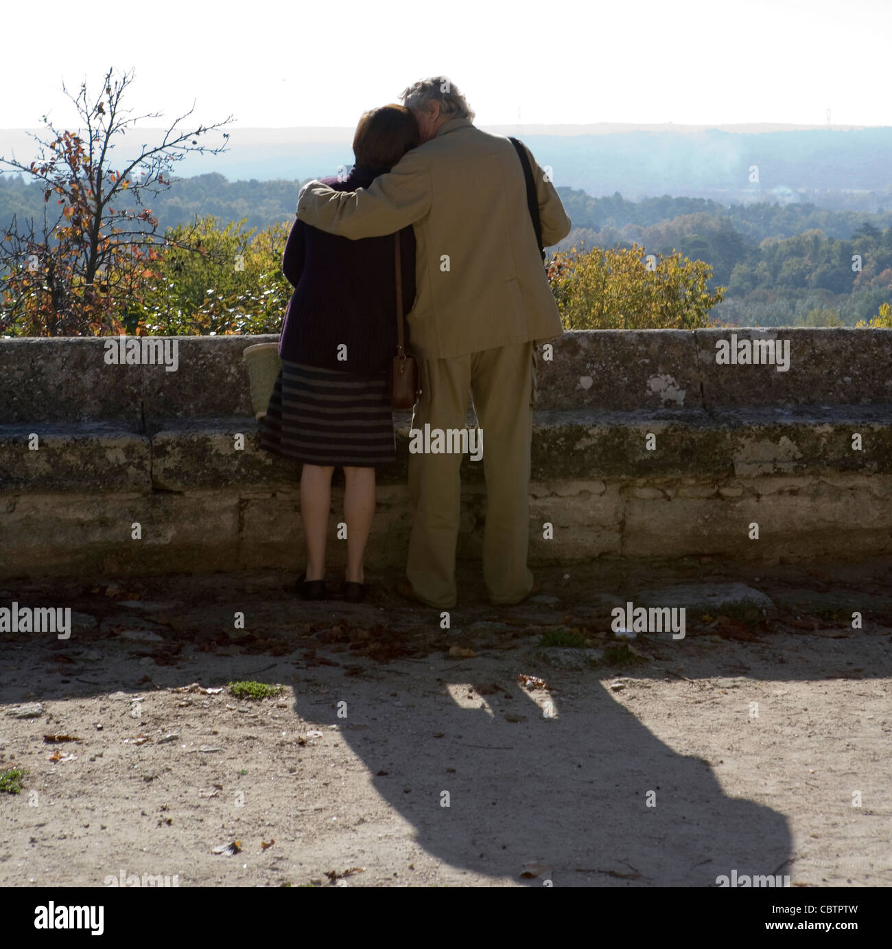 A couple cuddle in the small French town of Uze. Languedoc-Roussillon ...
