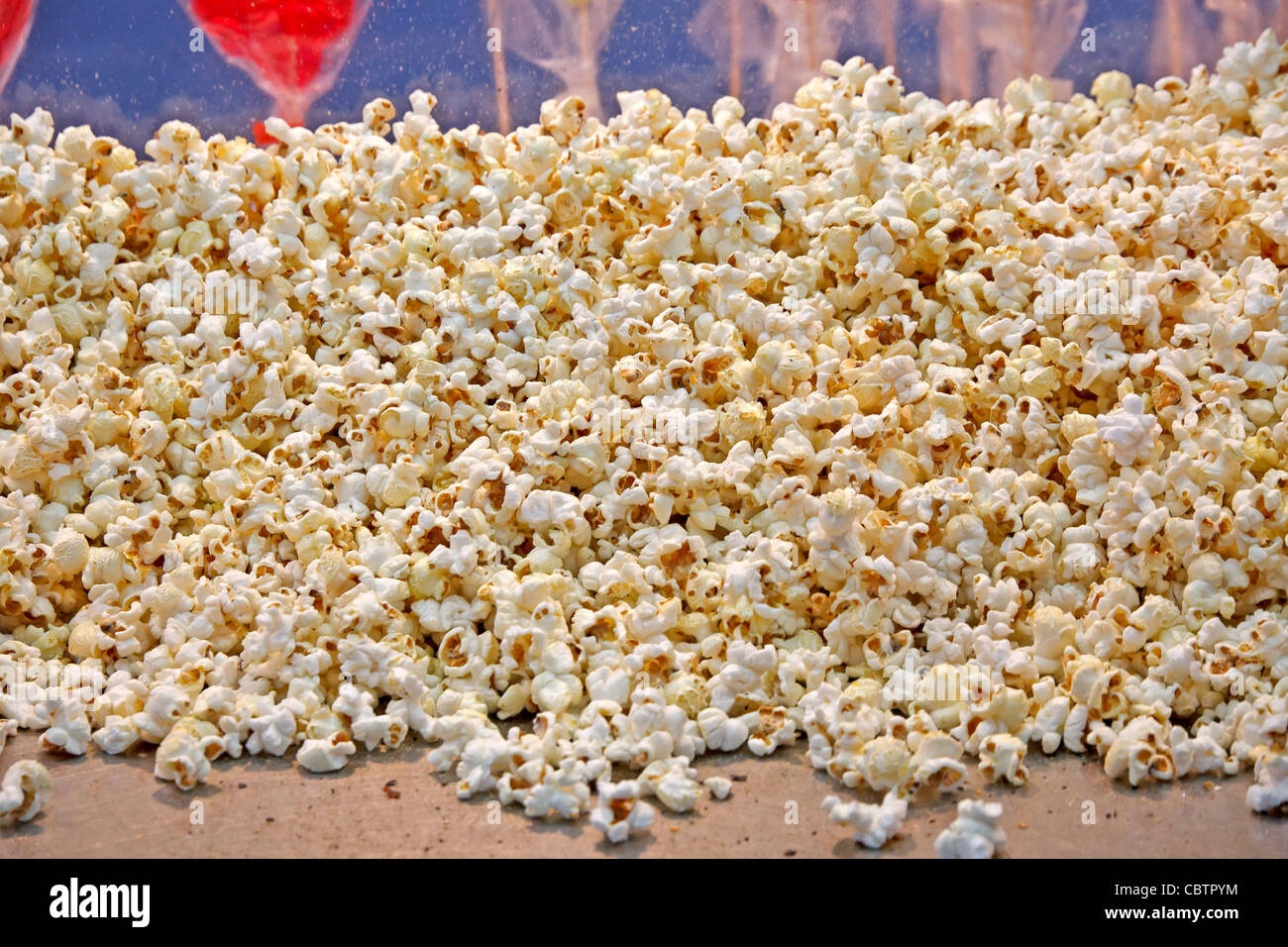 Popped kernels of pop corn snack Stock Photo - Alamy