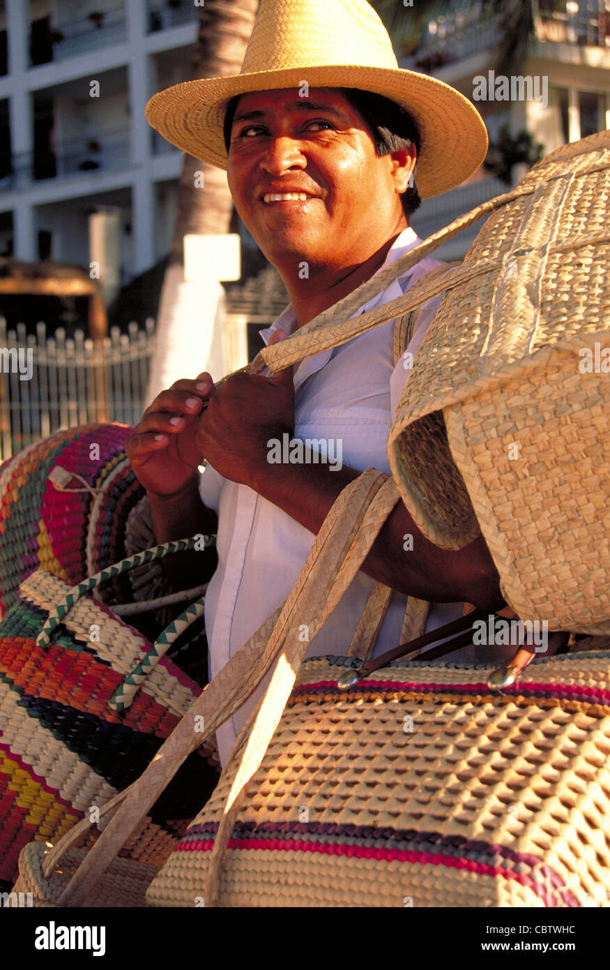 Man Carrying Baskets Stock Photo - Alamy