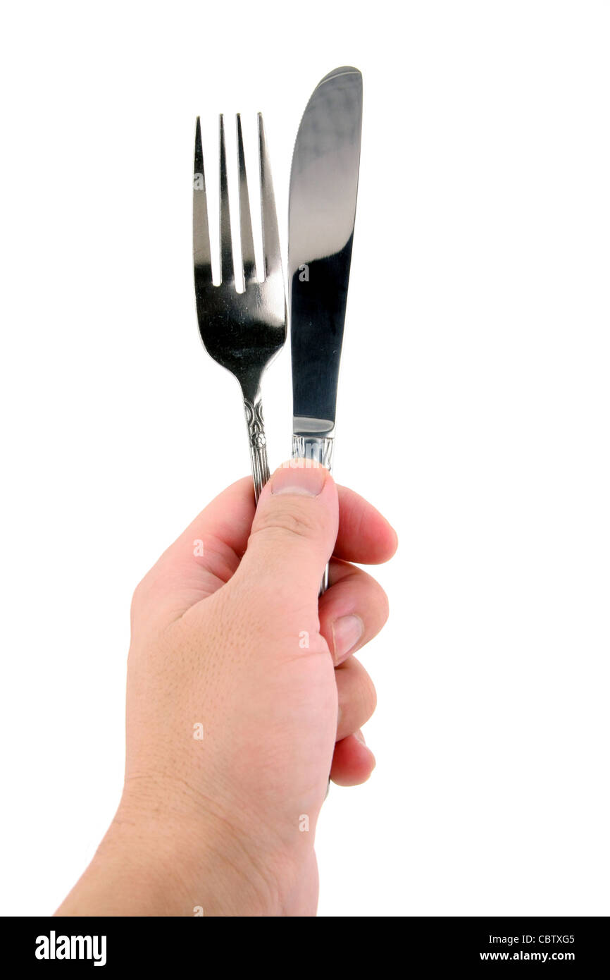 hand holding tableware with white background, concept of hungry Stock ...