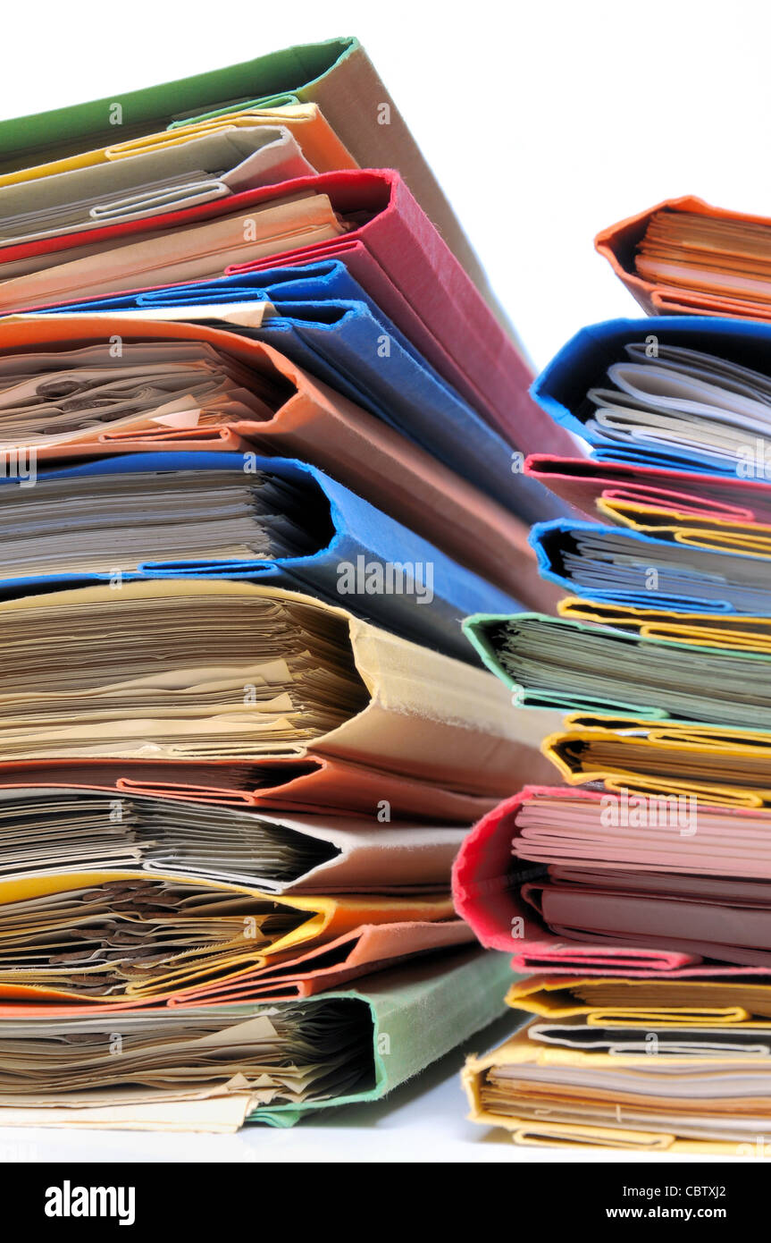 Two stacks of colorful office folders over white background Stock Photo ...