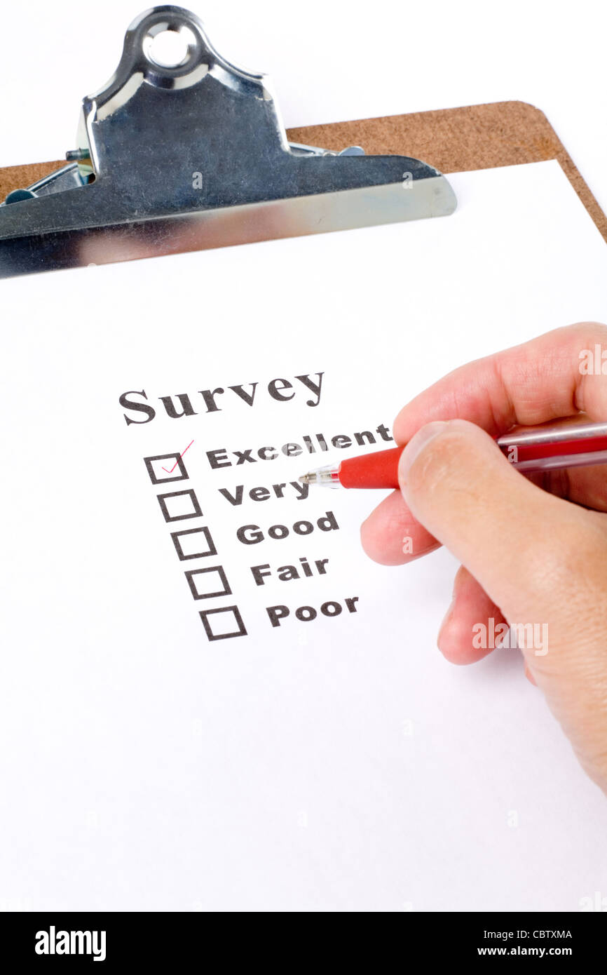 questionnaire and pen, business concept Stock Photo - Alamy