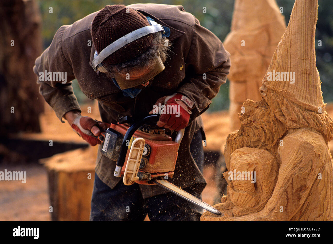Chainsaw carving carver wood hi-res stock photography and images - Alamy