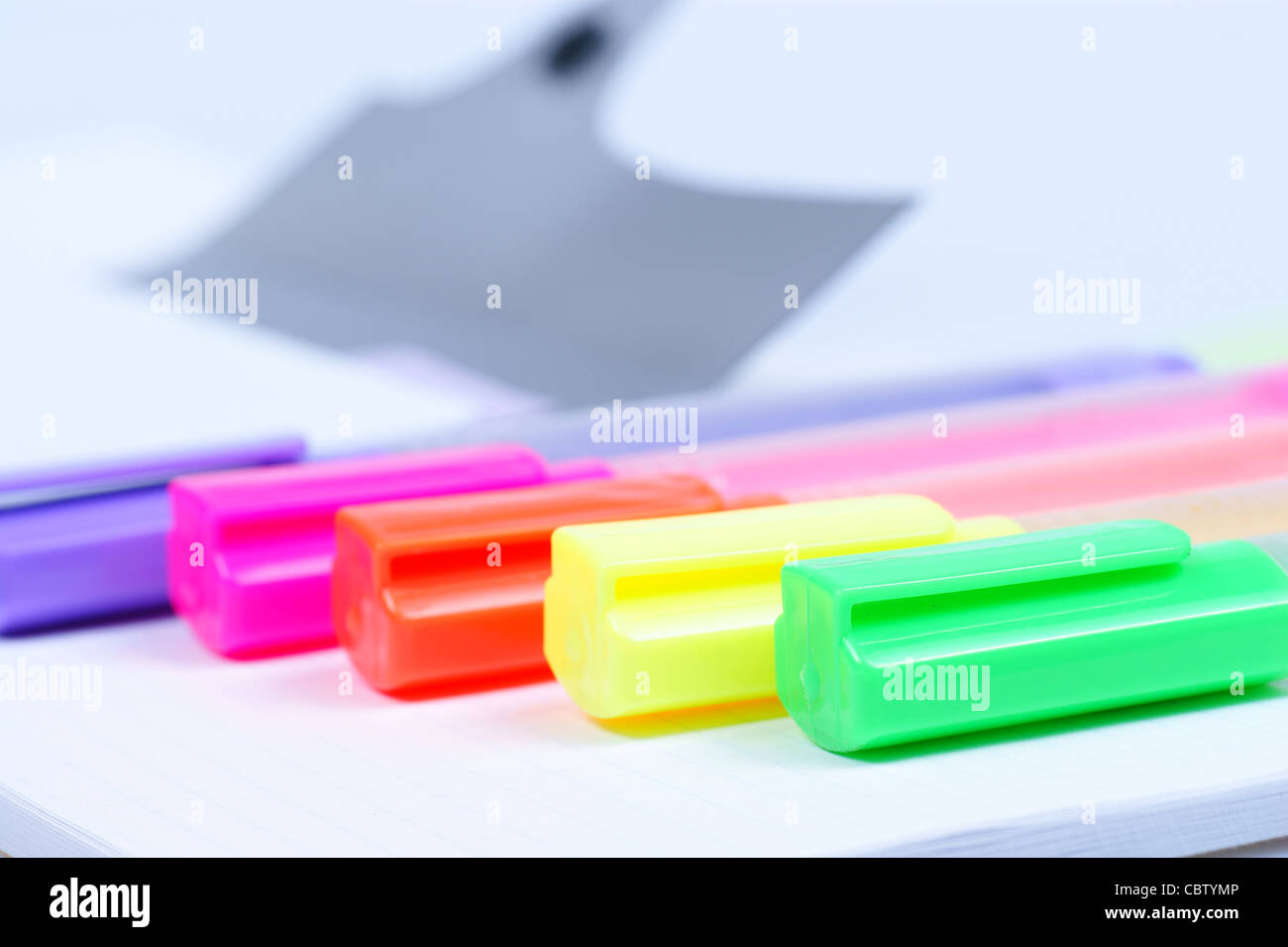 Colorful markers over a white background Stock Photo - Alamy