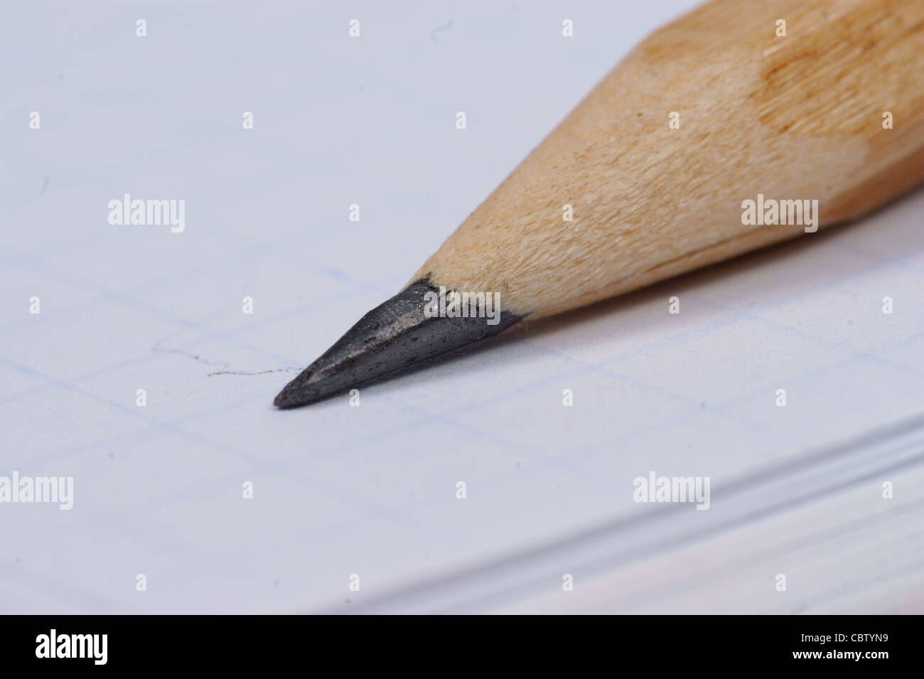 empty notebook and pencil isolated on white background Stock Photo - Alamy