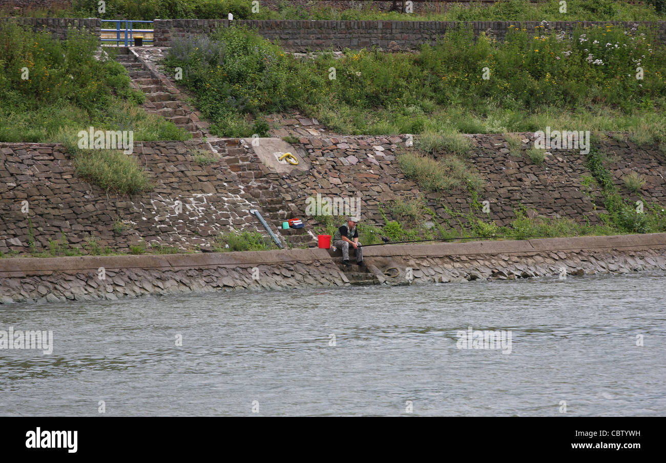 Man fishing from the left bank of the Rhine River near Bad Salzig ...