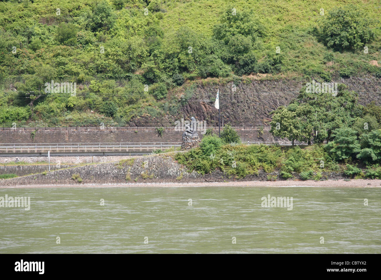 Statue of the Lorelei on the right bank of the Rhine River near Loreley ...