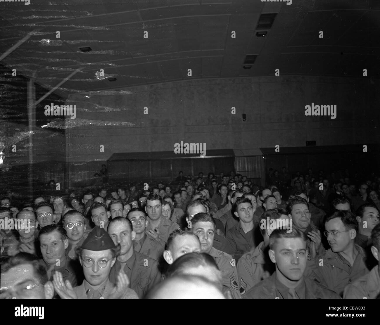 American GIs watching movie in basement during WWII war time england ...