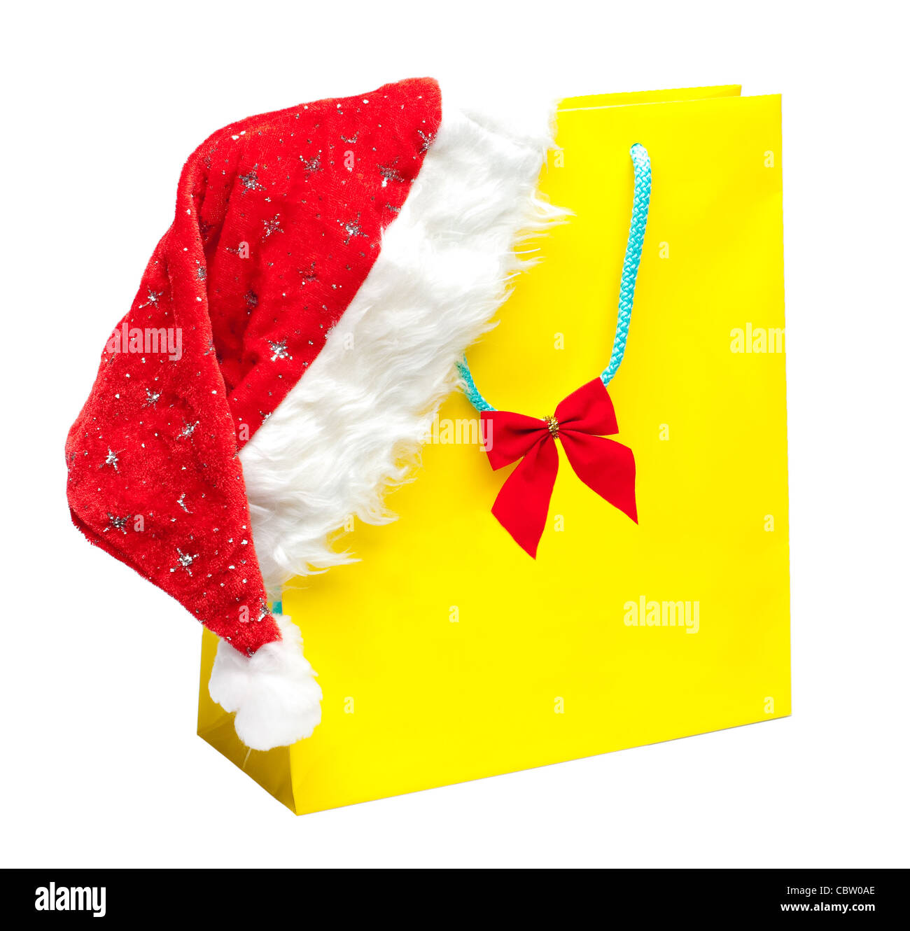yellow packet isolated on white with red santa hat Stock Photo - Alamy