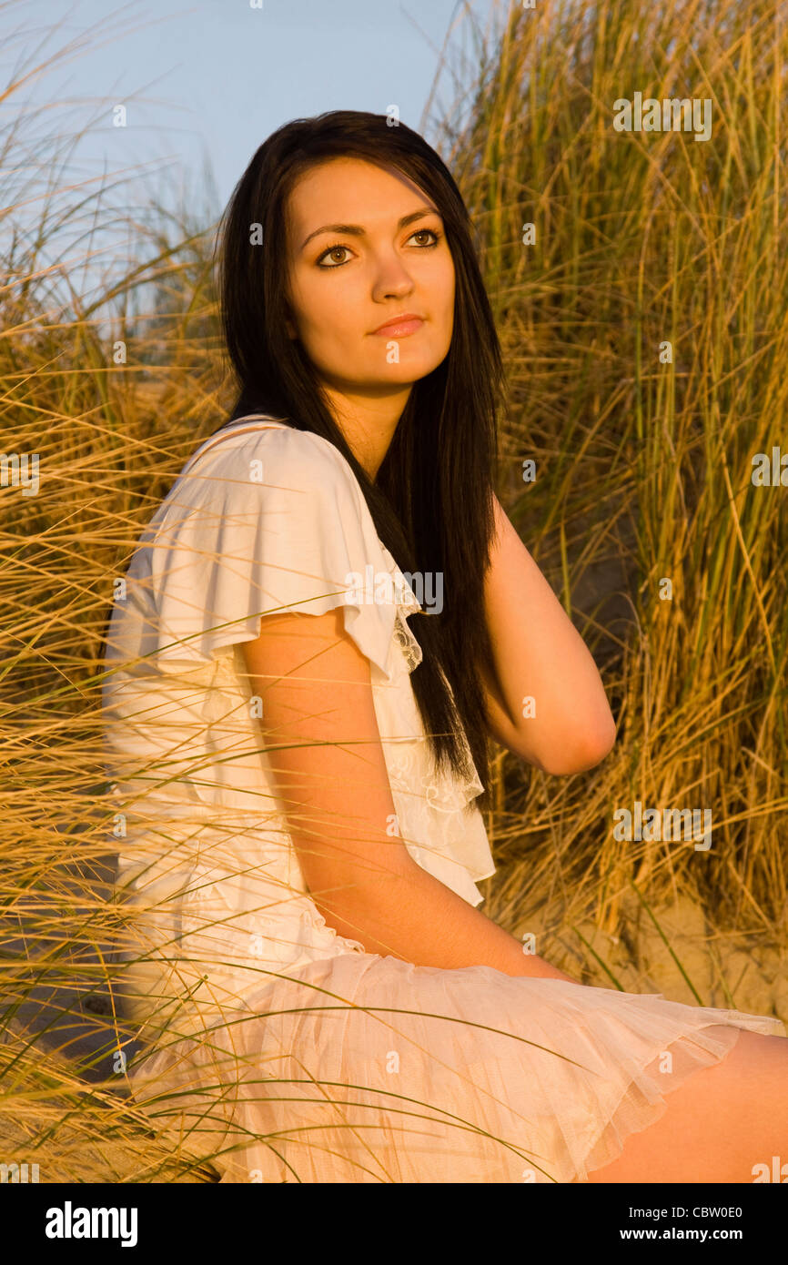 Sitting watching the sunset hi-res stock photography and images - Alamy