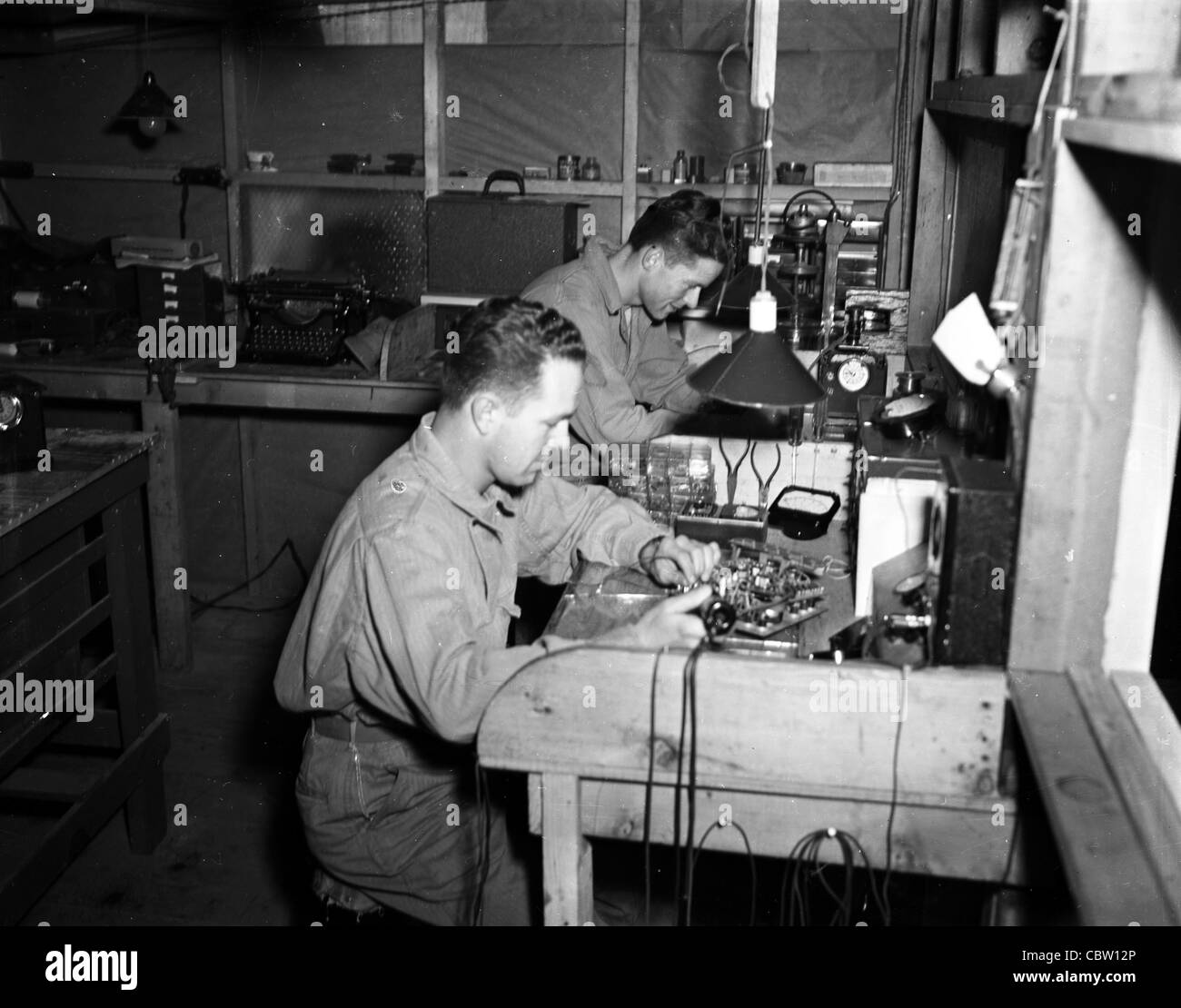 Europe and England during World War II. Americans working in repair ...