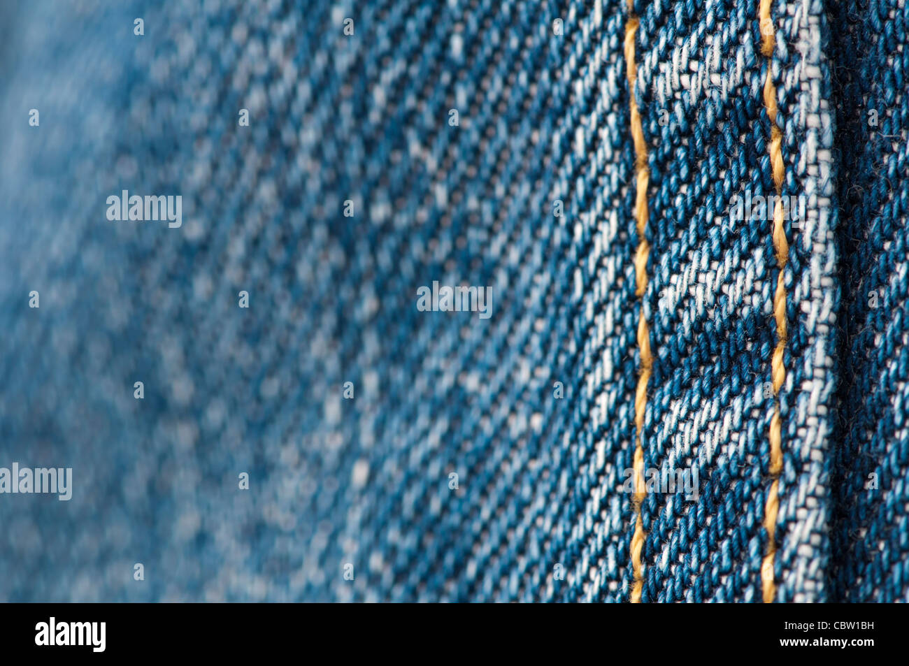 Orange stitch on the denim garment very close up.Jeans background Stock ...