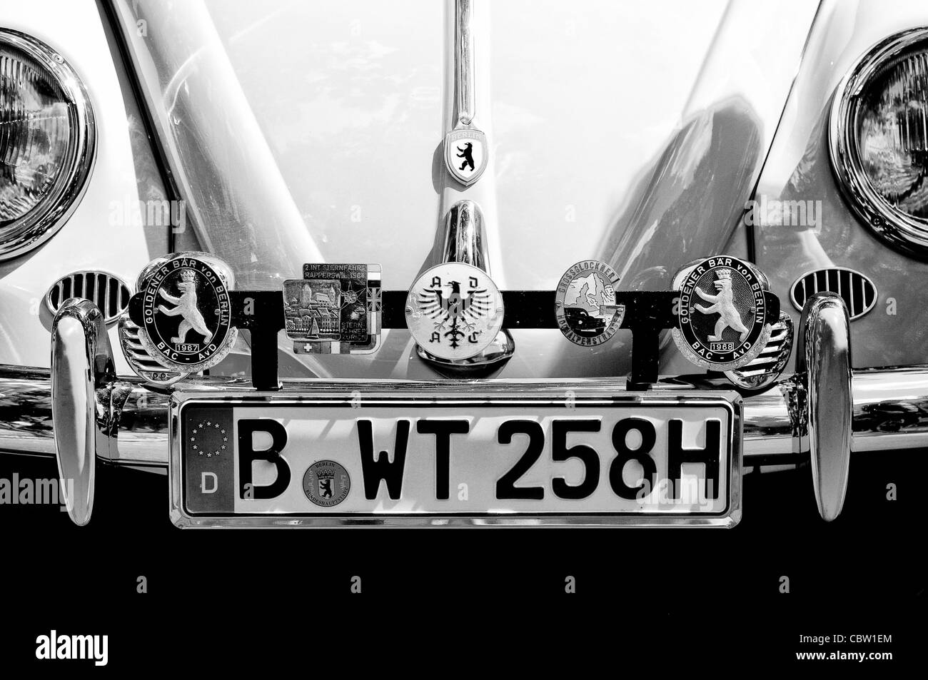 Signs of communities Volkswagen Beetle on the hood Stock Photo - Alamy