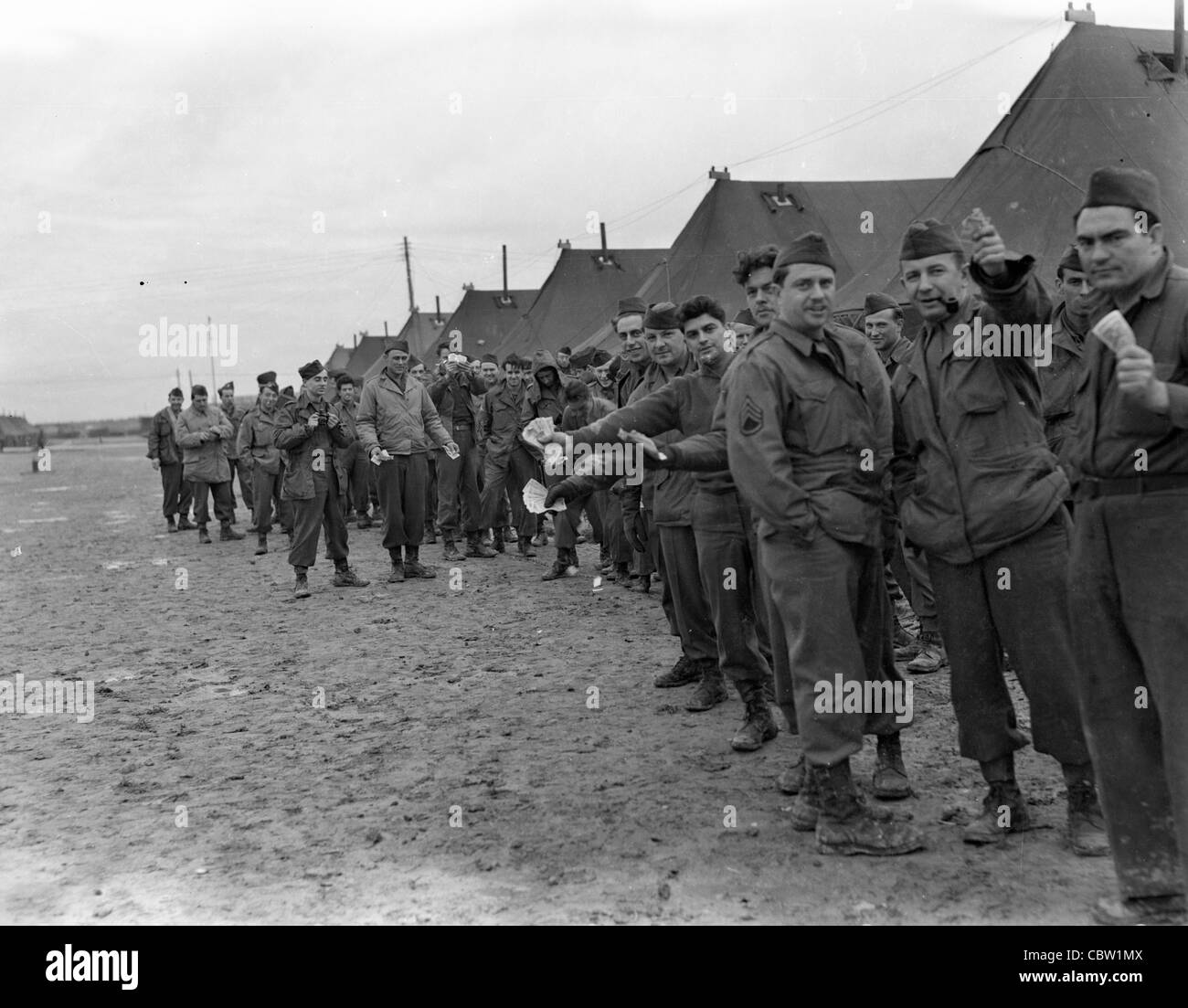 Europe and England during World War II. American GIs standing in line ...