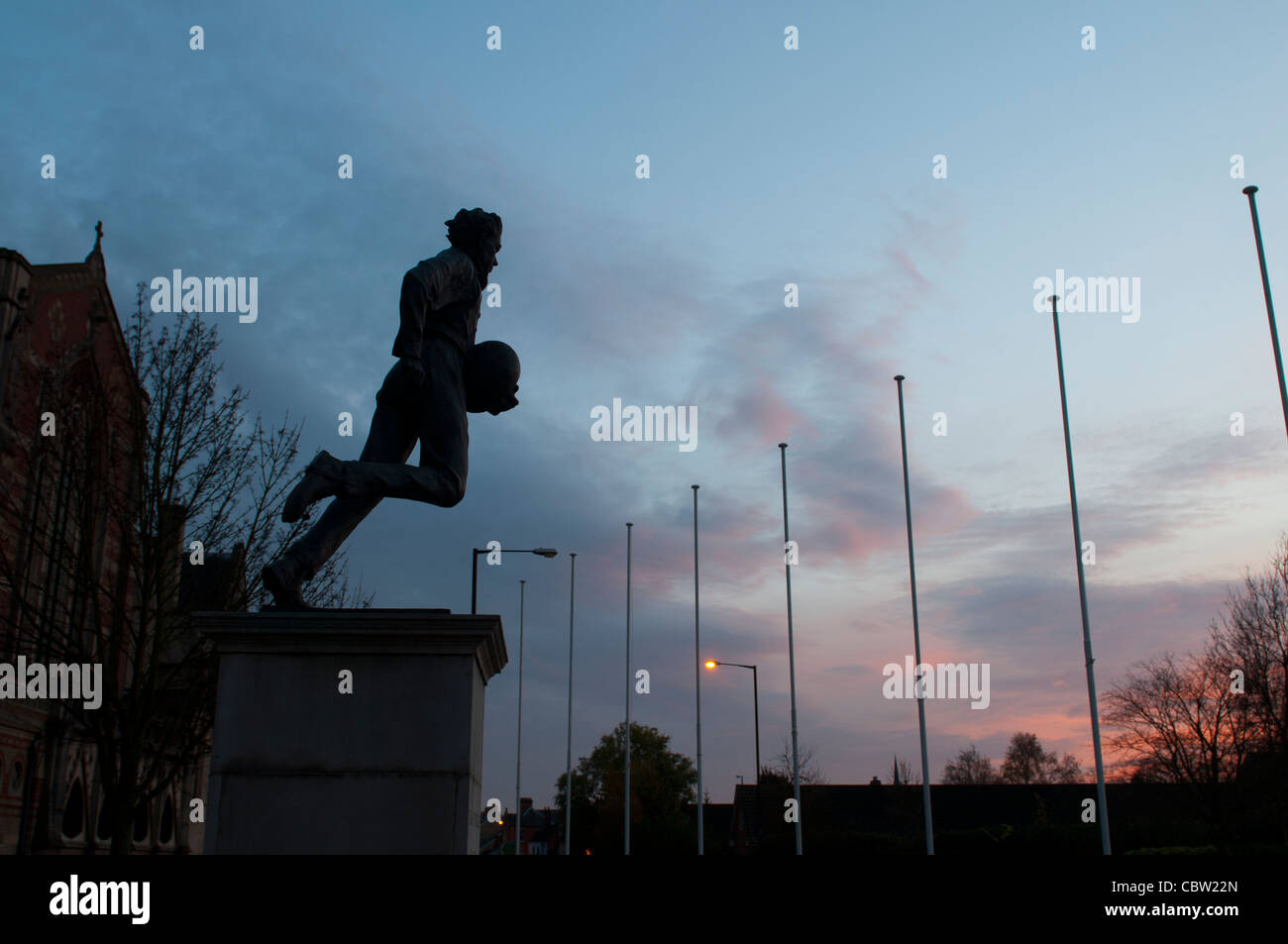 William Webb Ellis statue at sunset, Rugby, Warwickshire, England, UK ...
