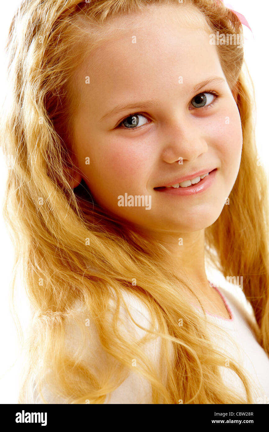 Portrait of cute girl looking at camera isolated on white background ...