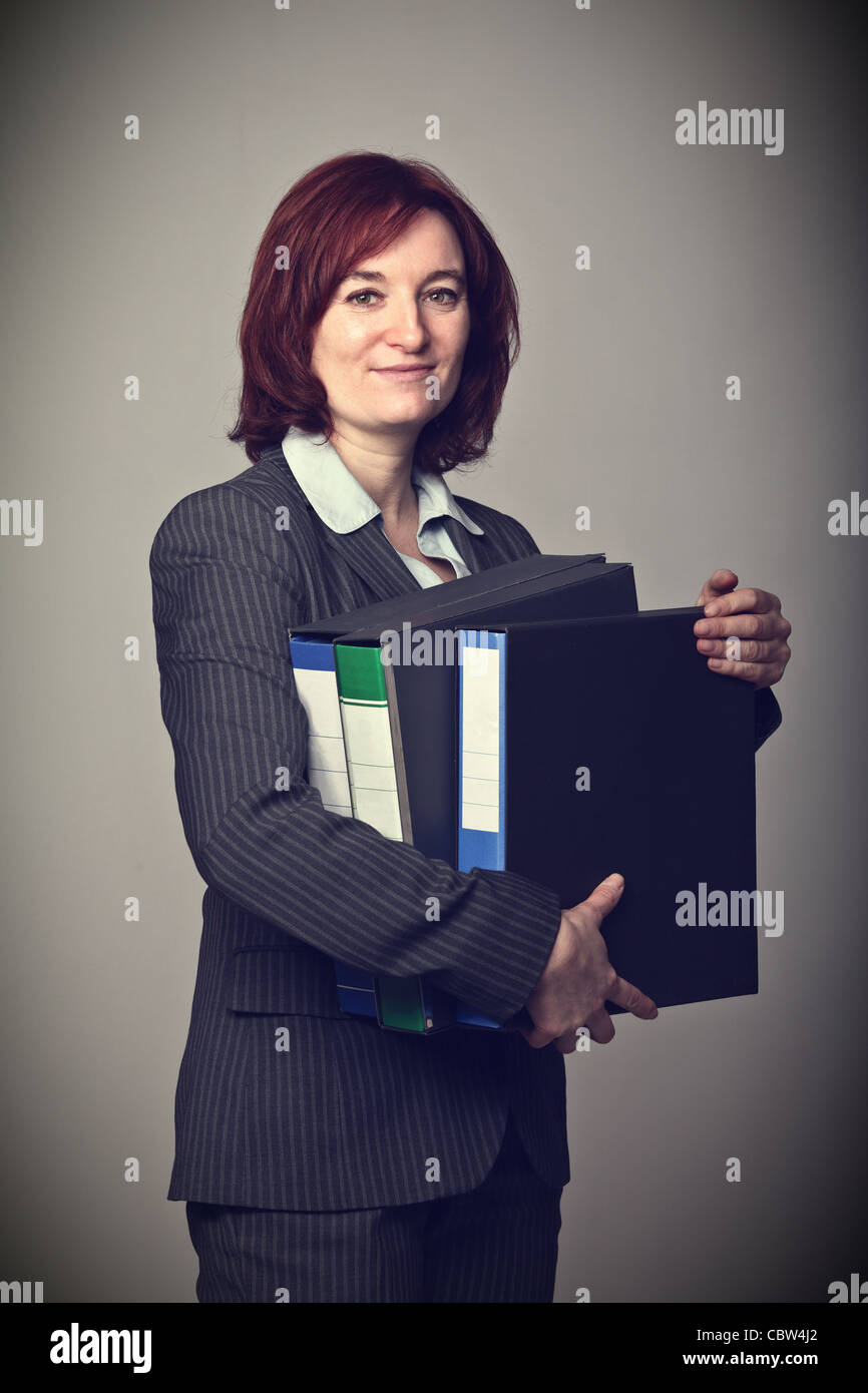 caucasian worker holding file folder Stock Photo - Alamy