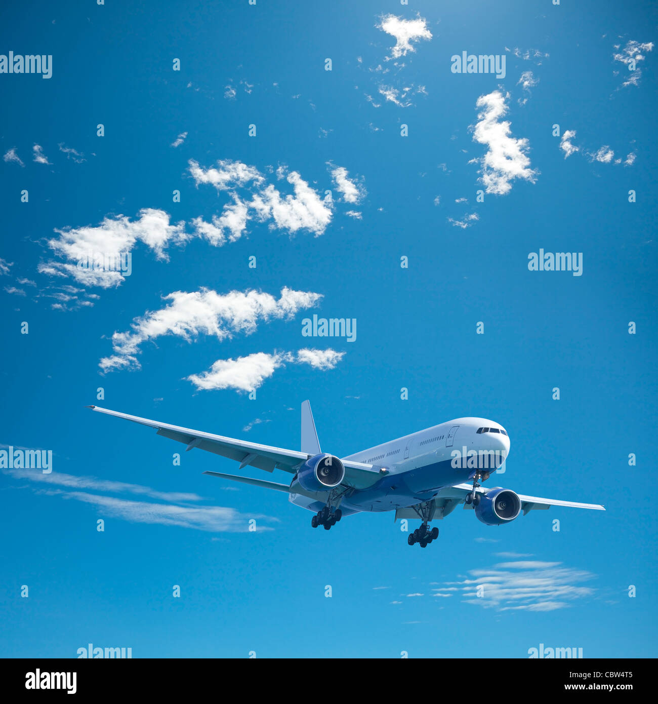 Jet aircraft in a noon sky. Square composition Stock Photo - Alamy