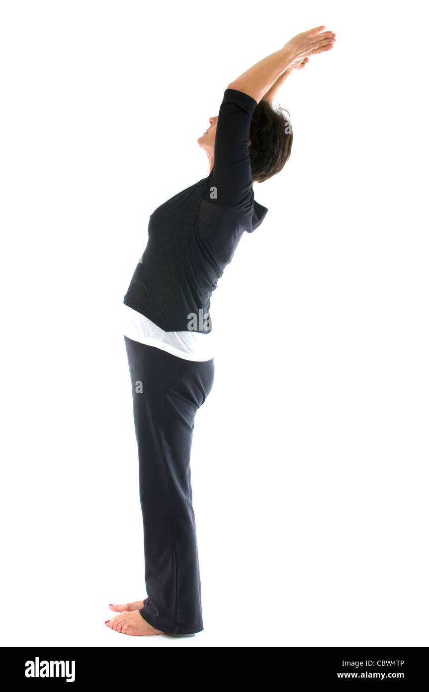 middle age senior woman yoga position stretch mountain tadasana Stock ...