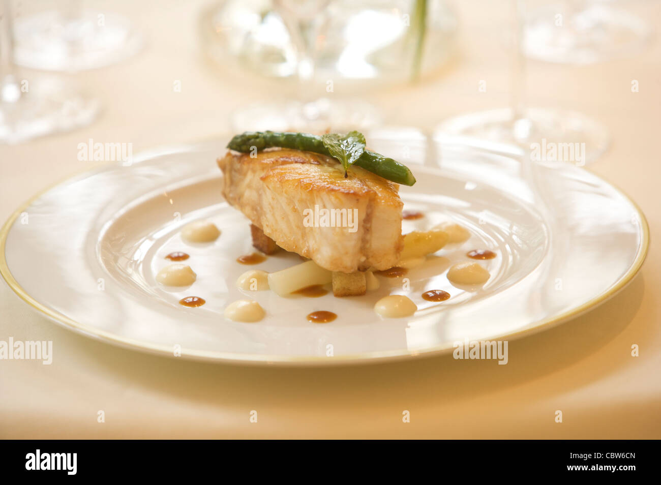 Salmon Fish Main course served on a table in the two 2 michelin star ...
