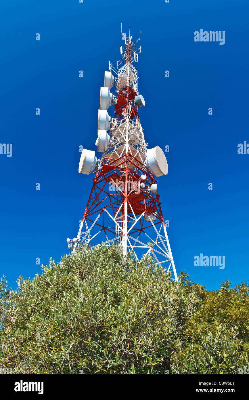 Communications tower with a beautiful blue sky Stock Photo - Alamy