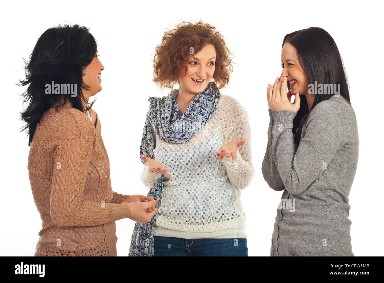 Happy three friends women having conversation and laughing together ...