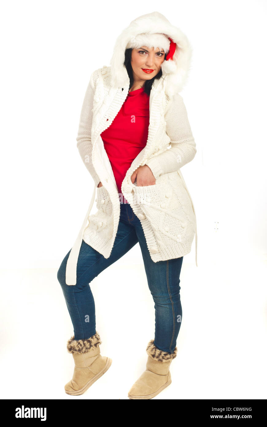 Full length of smiling woman in winter clothing isolated on white ...