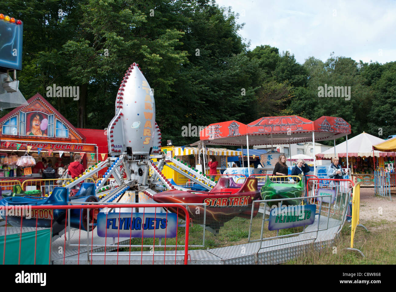 Fairground roundabout Star Wars Flying Jets rocket ride with other ...