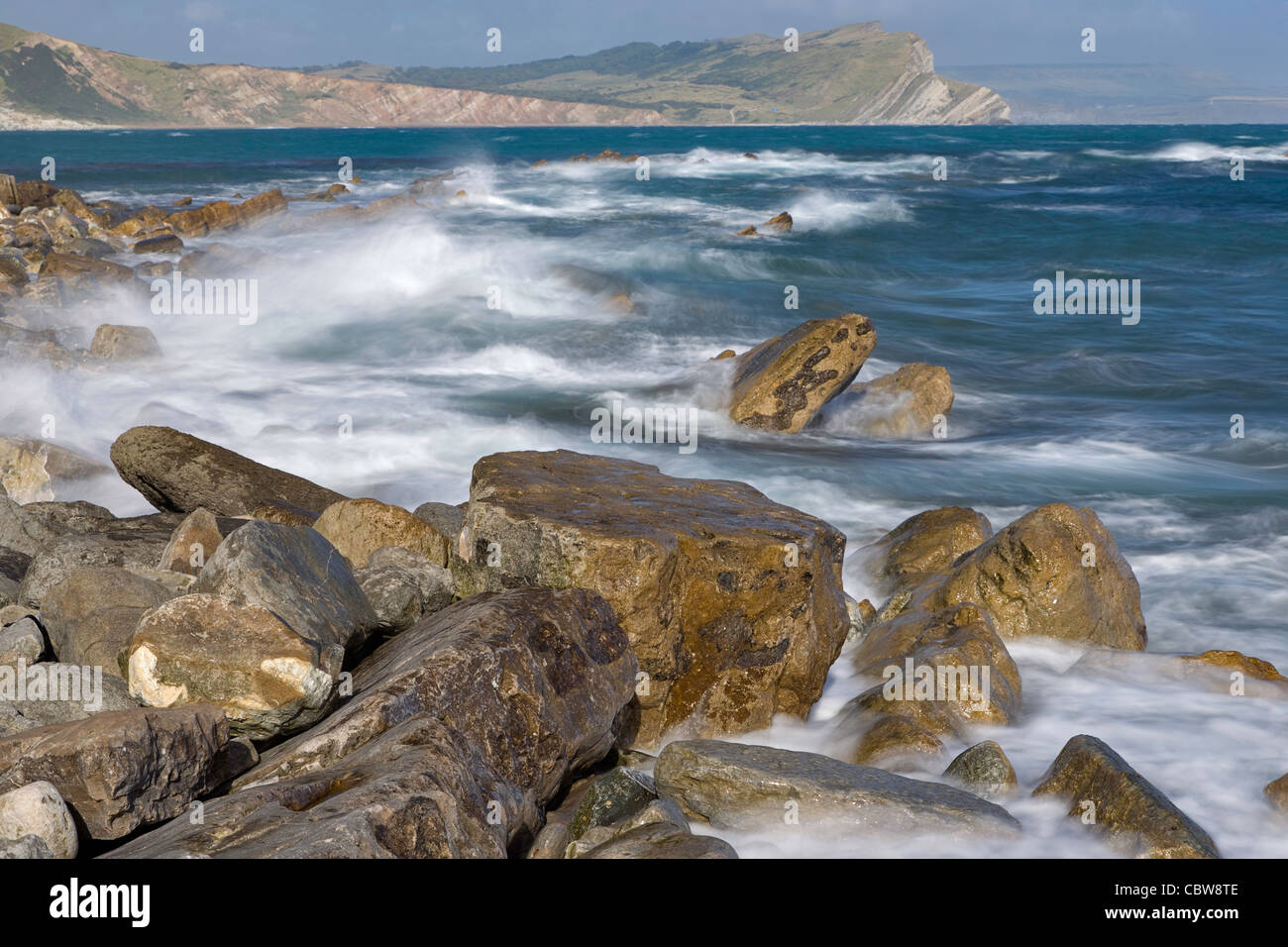 Rocks leading out to sea at Mupe Bay in Dorset. Looking towards ...