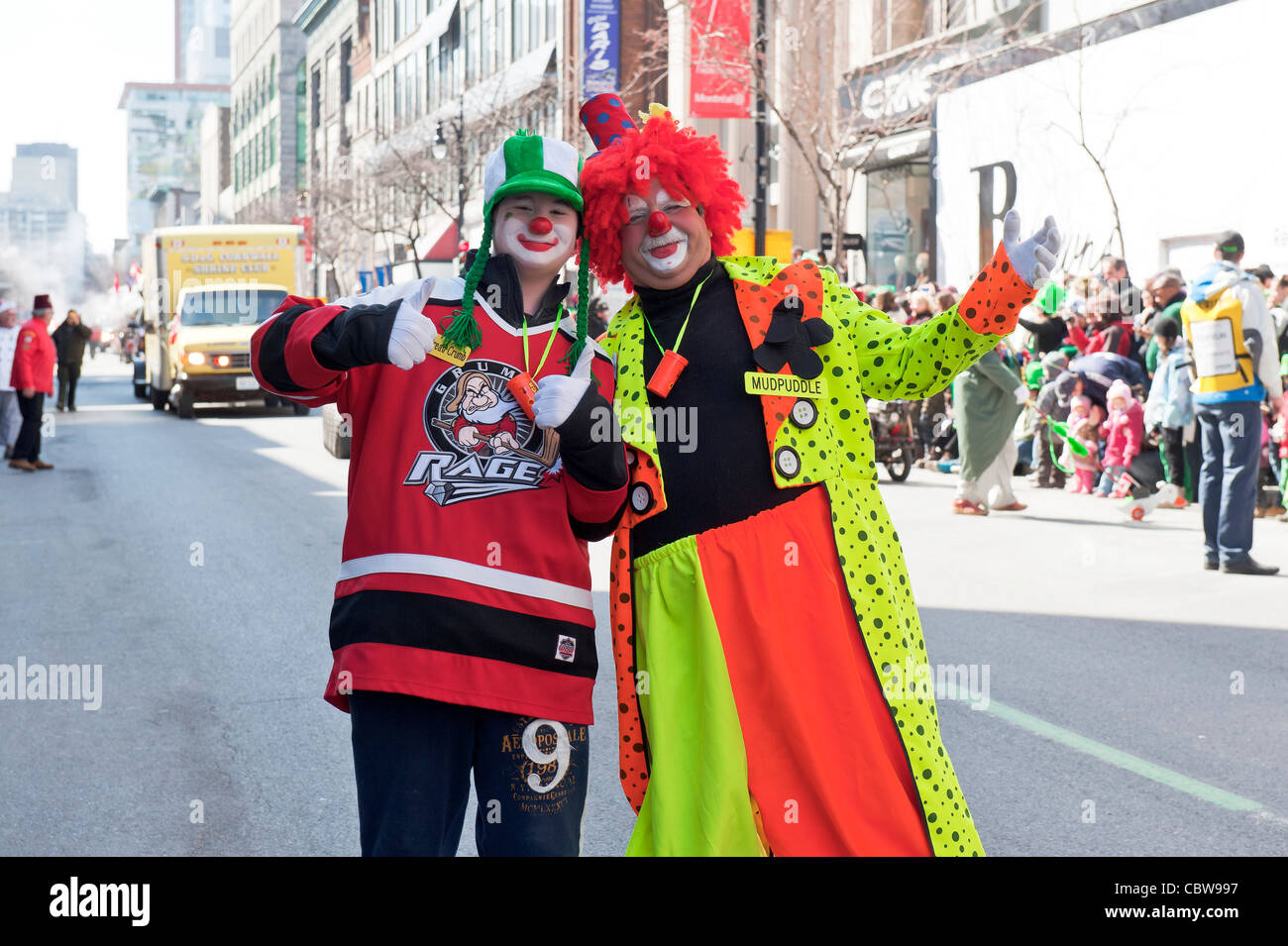 Two clowns participating in the St Patrick's day parade in Montreal ...