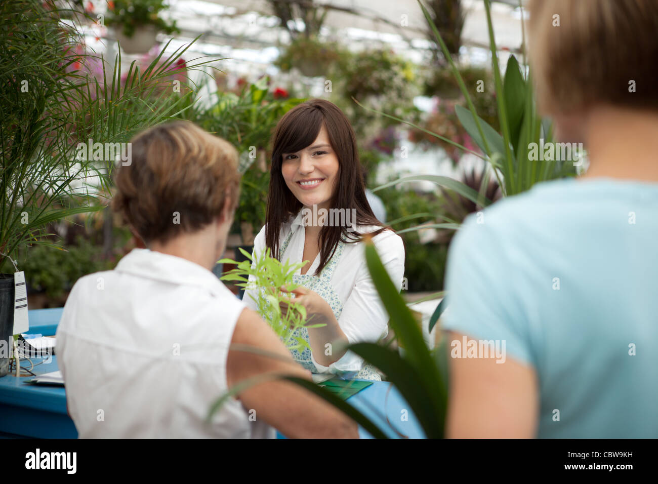 Customers in check out line hi-res stock photography and images - Alamy