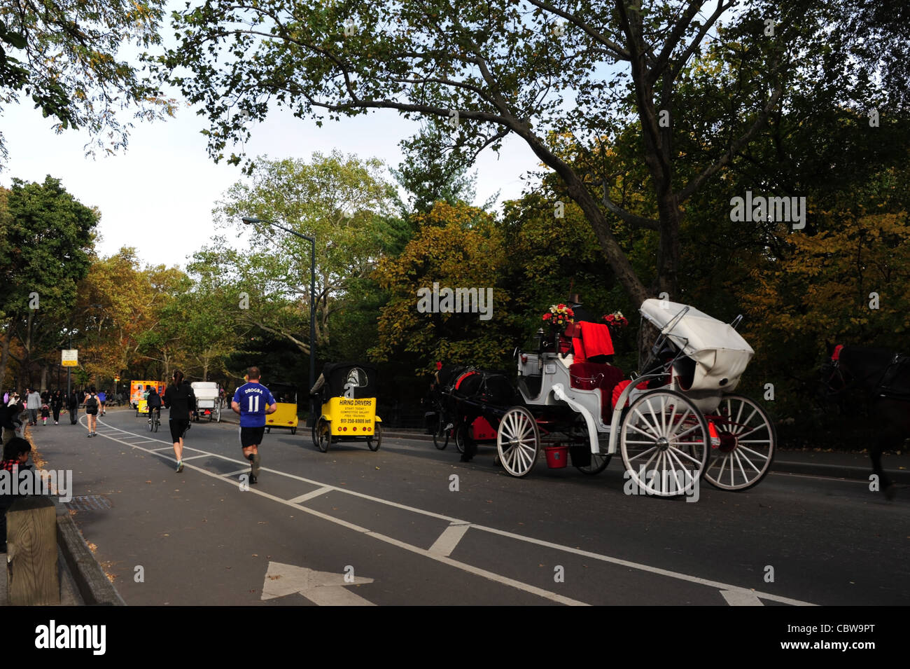 Vehicles 1 horse drawn carriages moving away transporting people ...