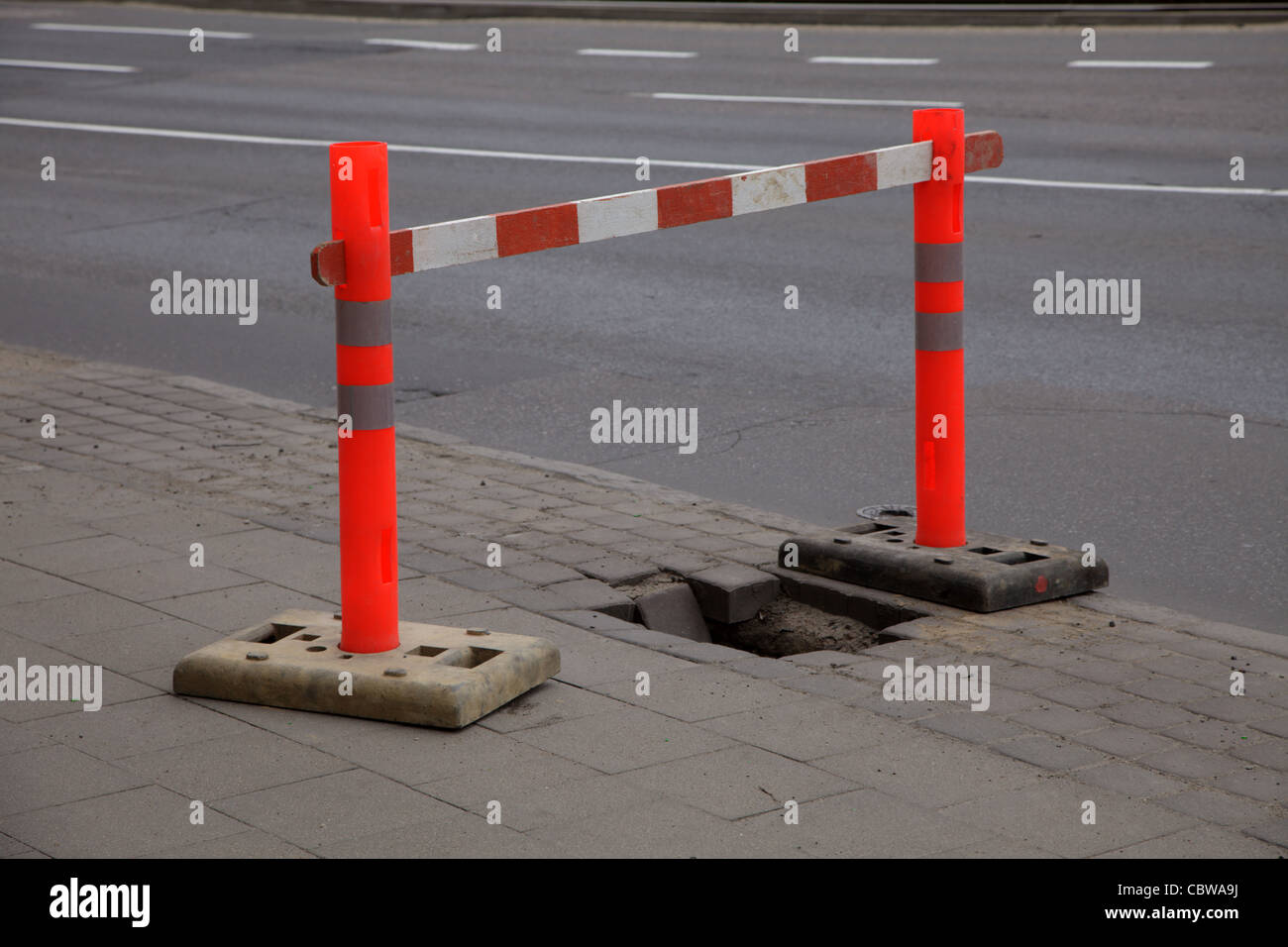 Construction barricade, Warning Cone outdoor Stock Photo - Alamy