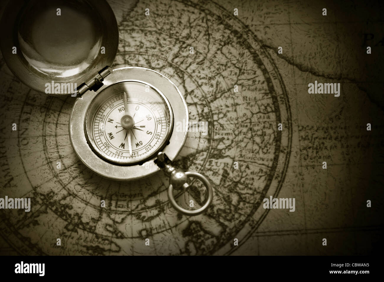 old compass on vintage map Stock Photo - Alamy