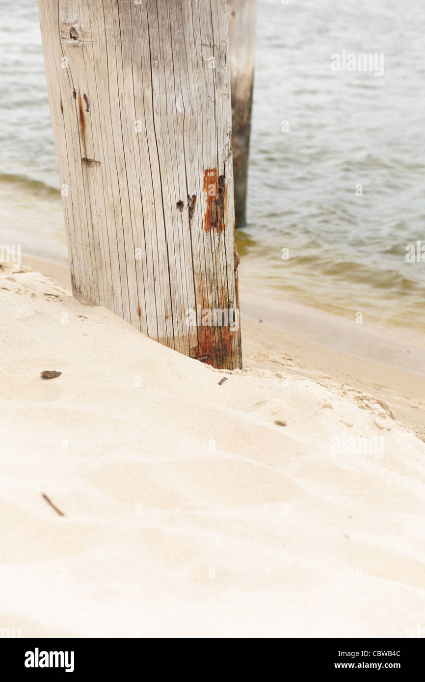 rows of piles on the sea beach - outdoor Stock Photo - Alamy