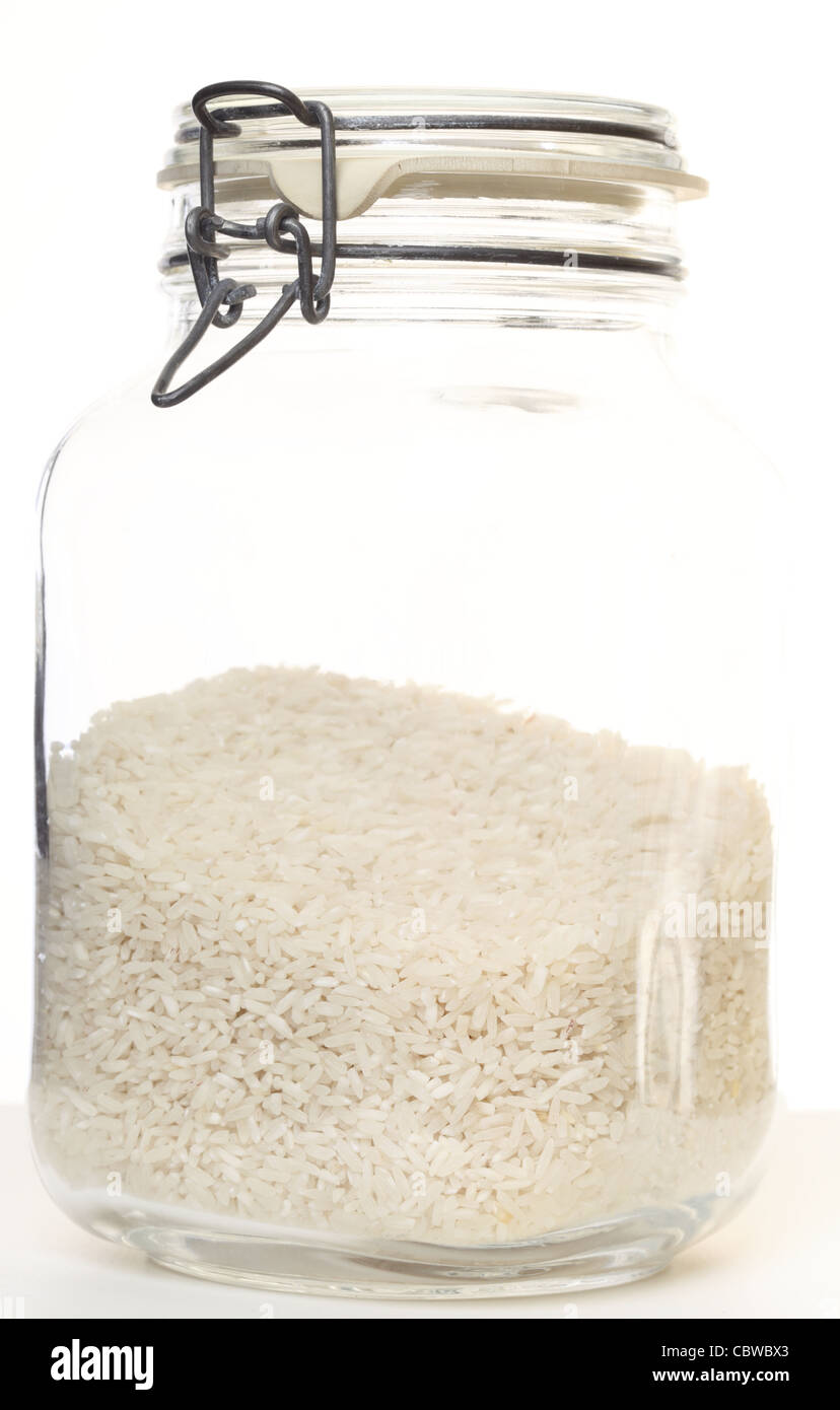natural rice in jar on white background Stock Photo - Alamy