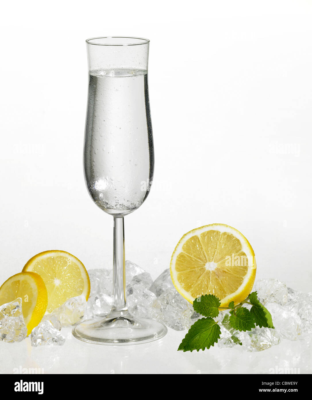 studio photography of a clear drink in fresh ambiance with citrus ...